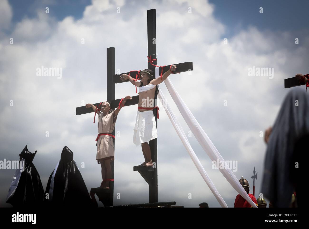 Real crucifixion and flagellants parade for Holy Week, Good Friday ...