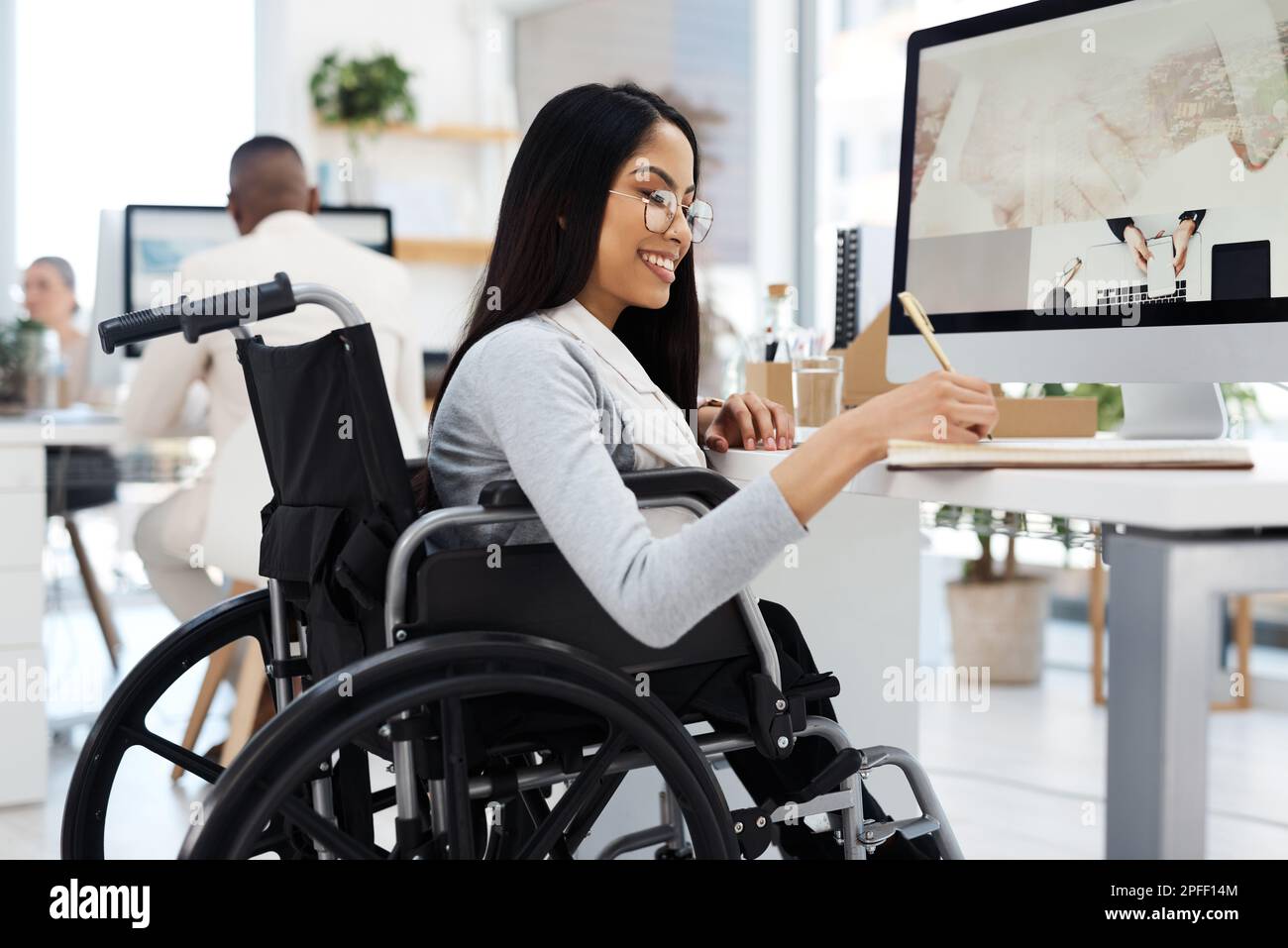 Crossing off things from her to do list. an attractive young ...