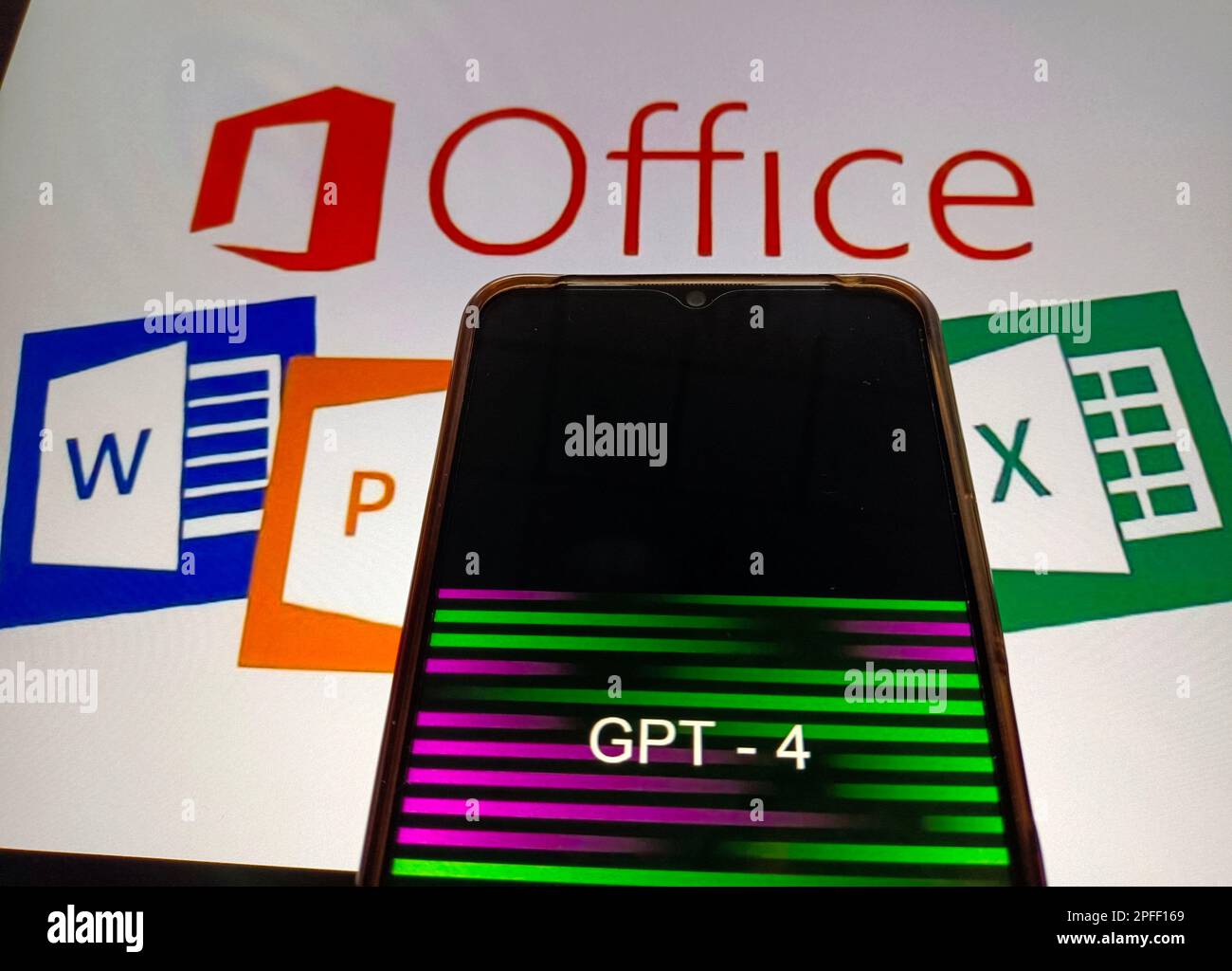 SUQIAN, CHINA - MARCH 17, 2023 - A citizen uses his mobile phone to check GPT-4 embedded Office ...