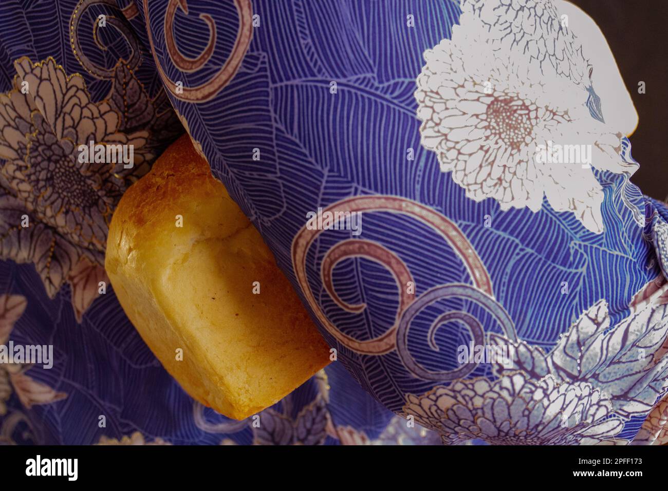 A loaf of white bread under the arm Stock Photo - Alamy