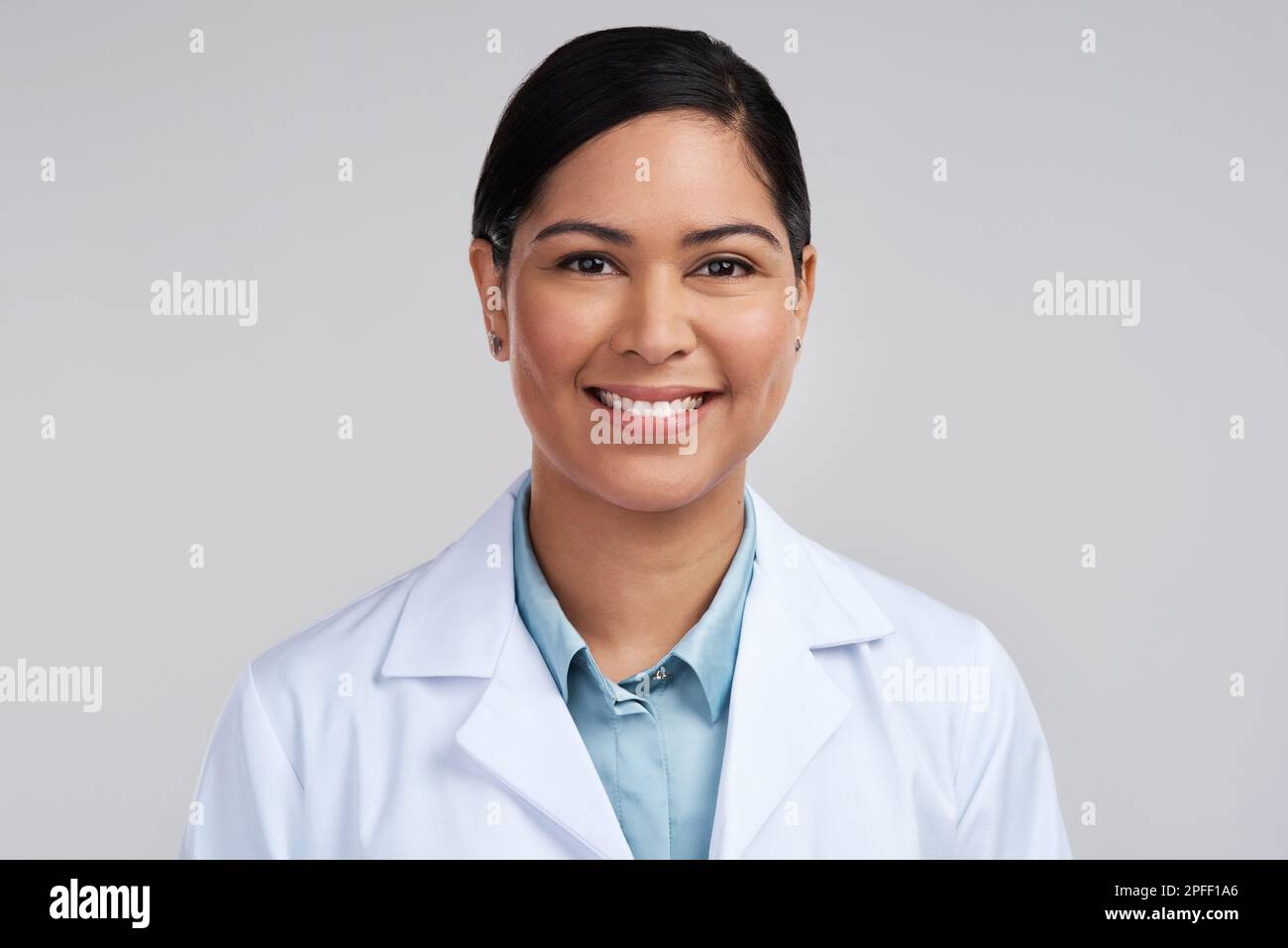 Smiling for science. Cropped portrait of an attractive young female ...