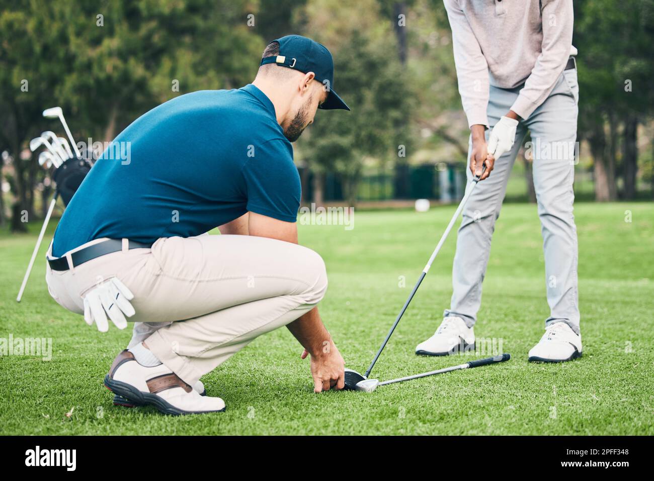Teaching, golf lesson and sports coach help man with swing, driver or ...