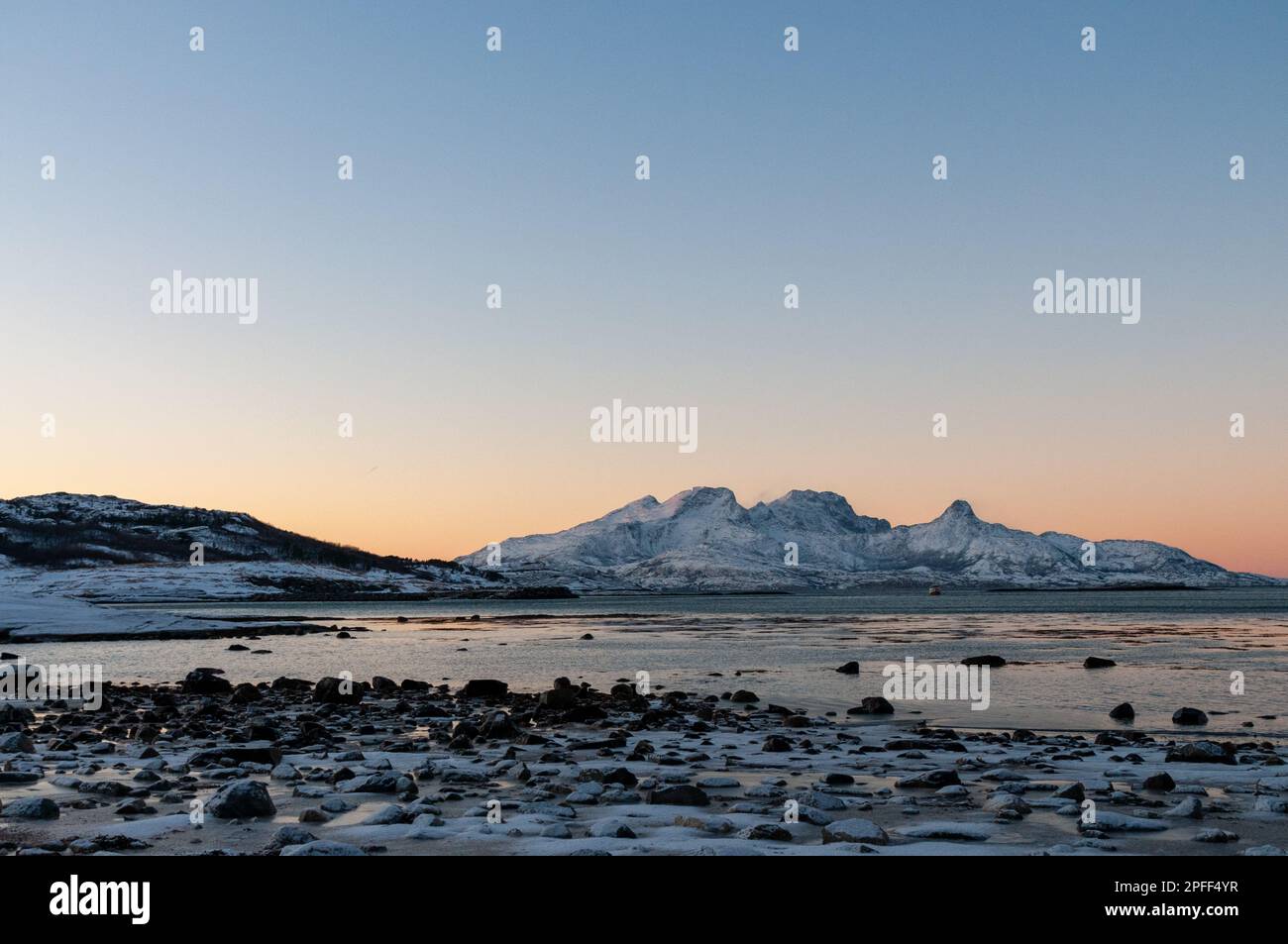 Landscape shot highlighting the rugged mountains and snow-covered ...