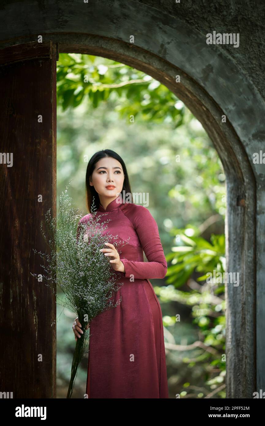 Ho Chi Minh city, Viet Nam: Portrait of a Vietnamese girl wearing a ...