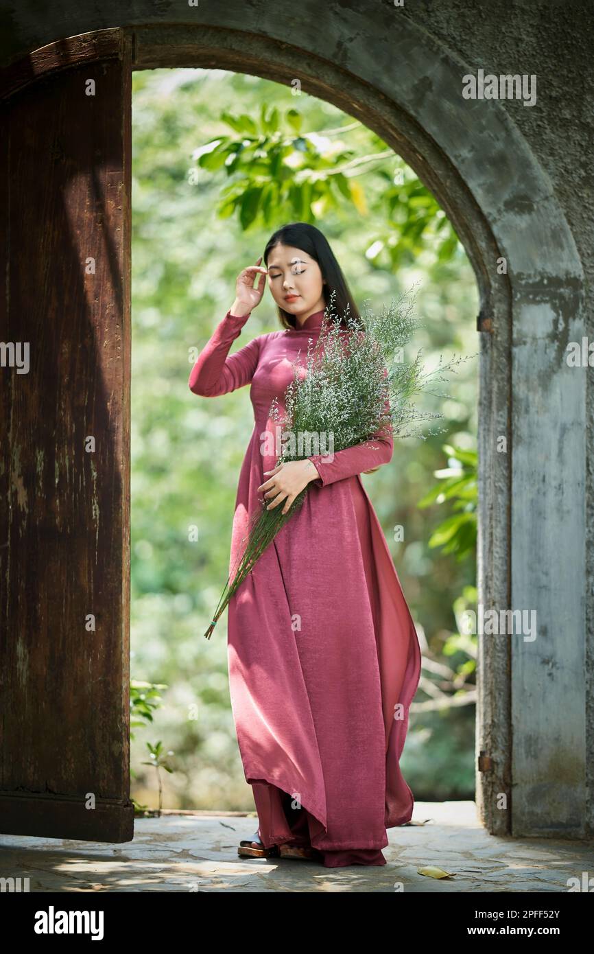 Ho Chi Minh city, Viet Nam: Portrait of a Vietnamese girl wearing a ...