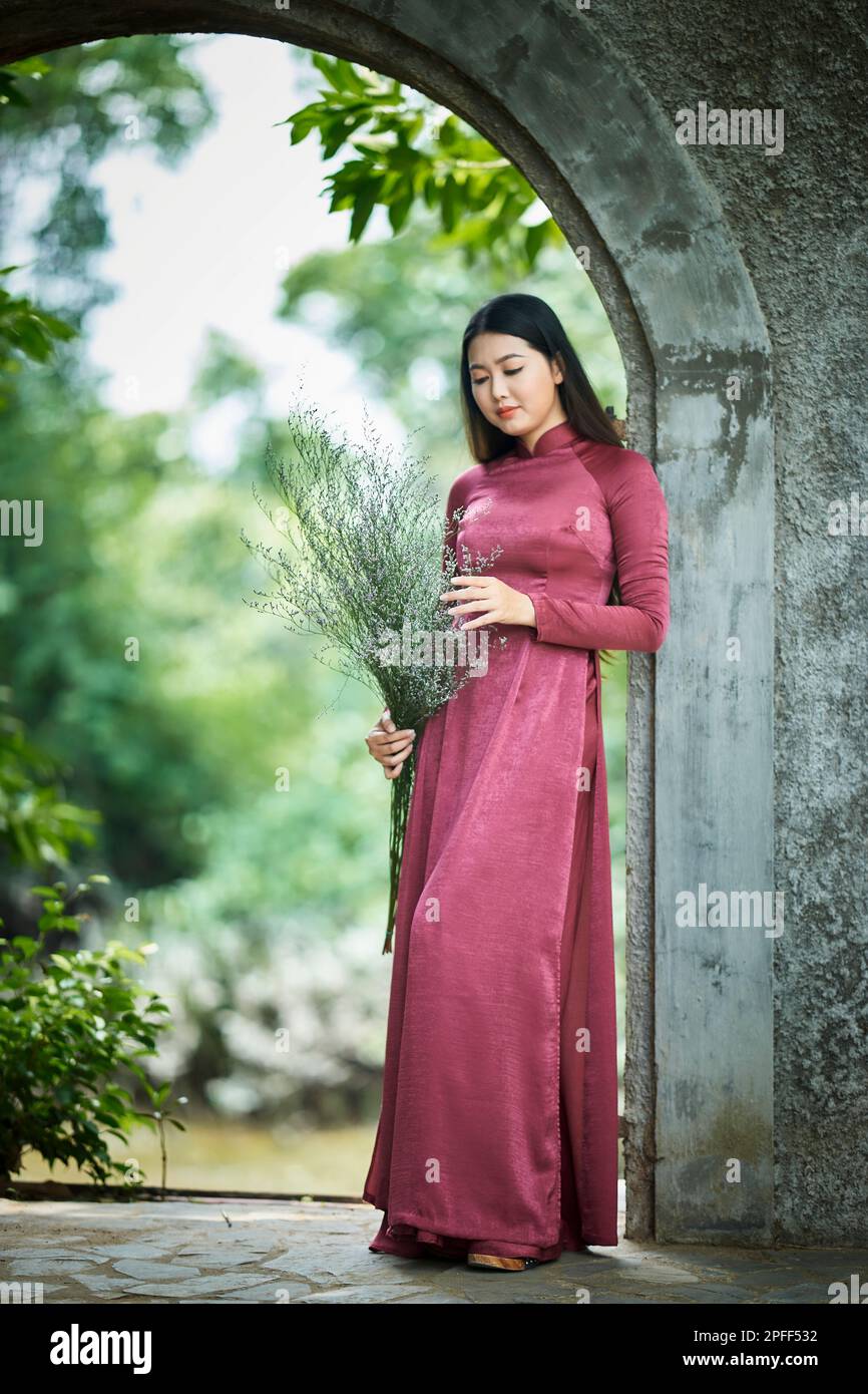 Ho Chi Minh city, Viet Nam: Portrait of a Vietnamese girl wearing a ...