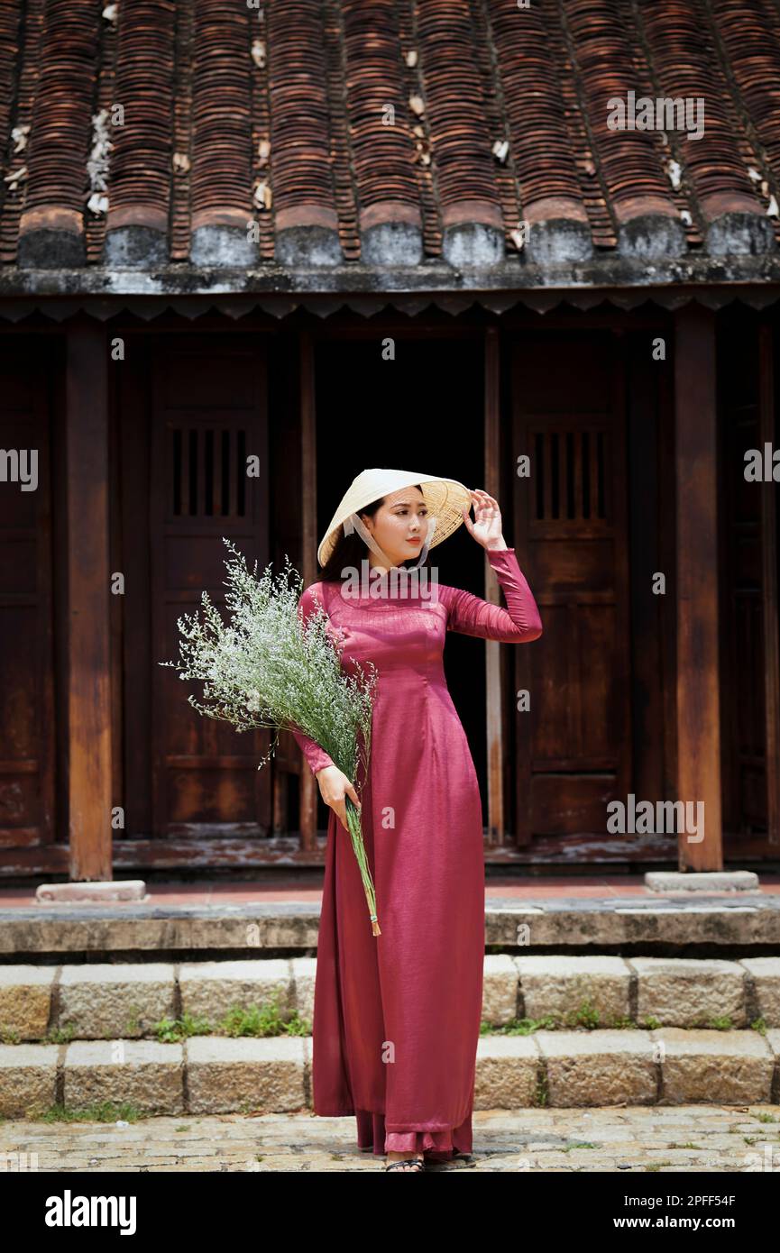 Ho Chi Minh city, Viet Nam: Portrait of a Vietnamese girl wearing a ...