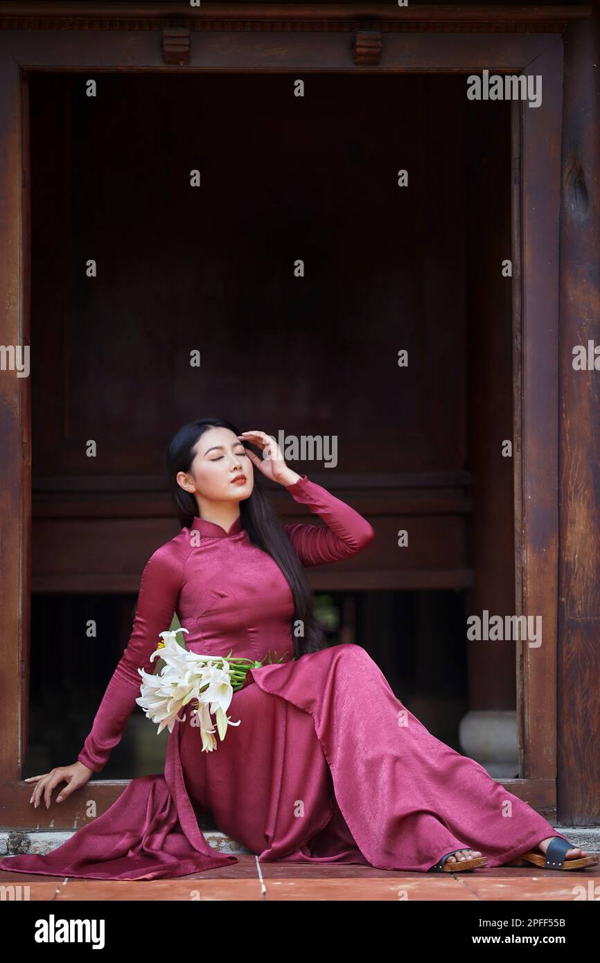 Ho Chi Minh city, Viet Nam: Portrait of a Vietnamese girl wearing a ...