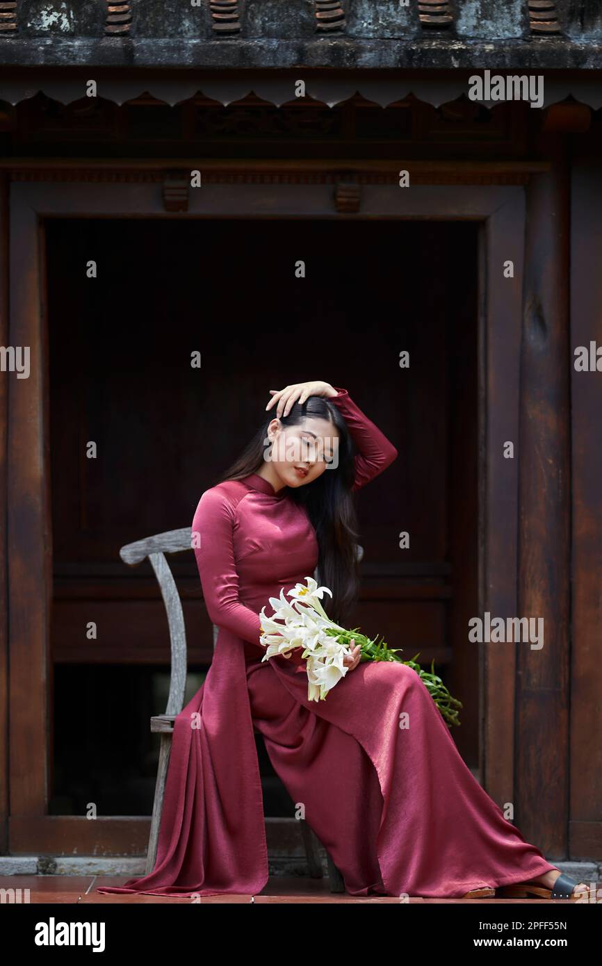 Ho Chi Minh city, Viet Nam: Portrait of a Vietnamese girl wearing a ...