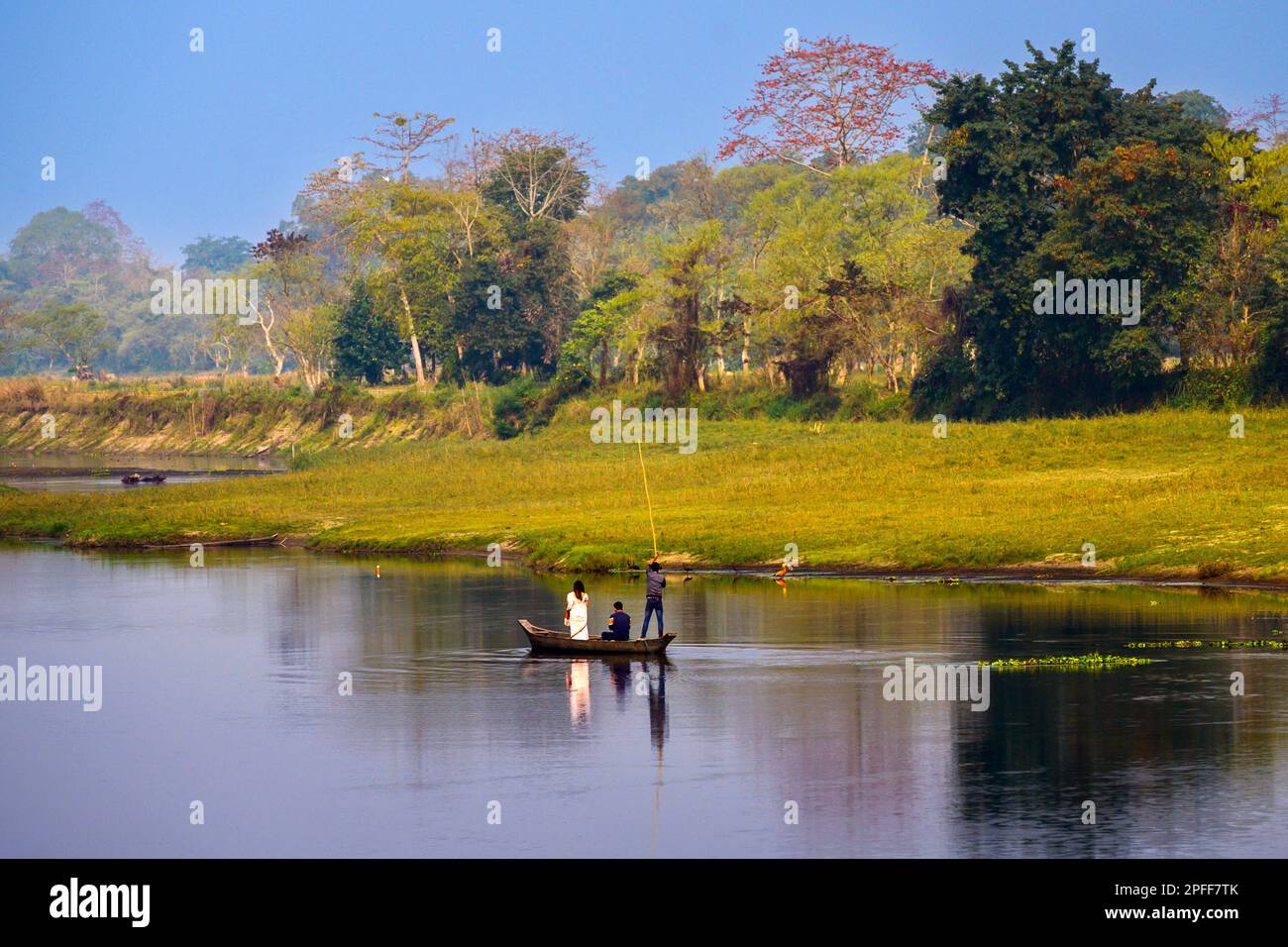Autumn landscape with a boat. Majuli is the world's most oversized river island on the bank of ...