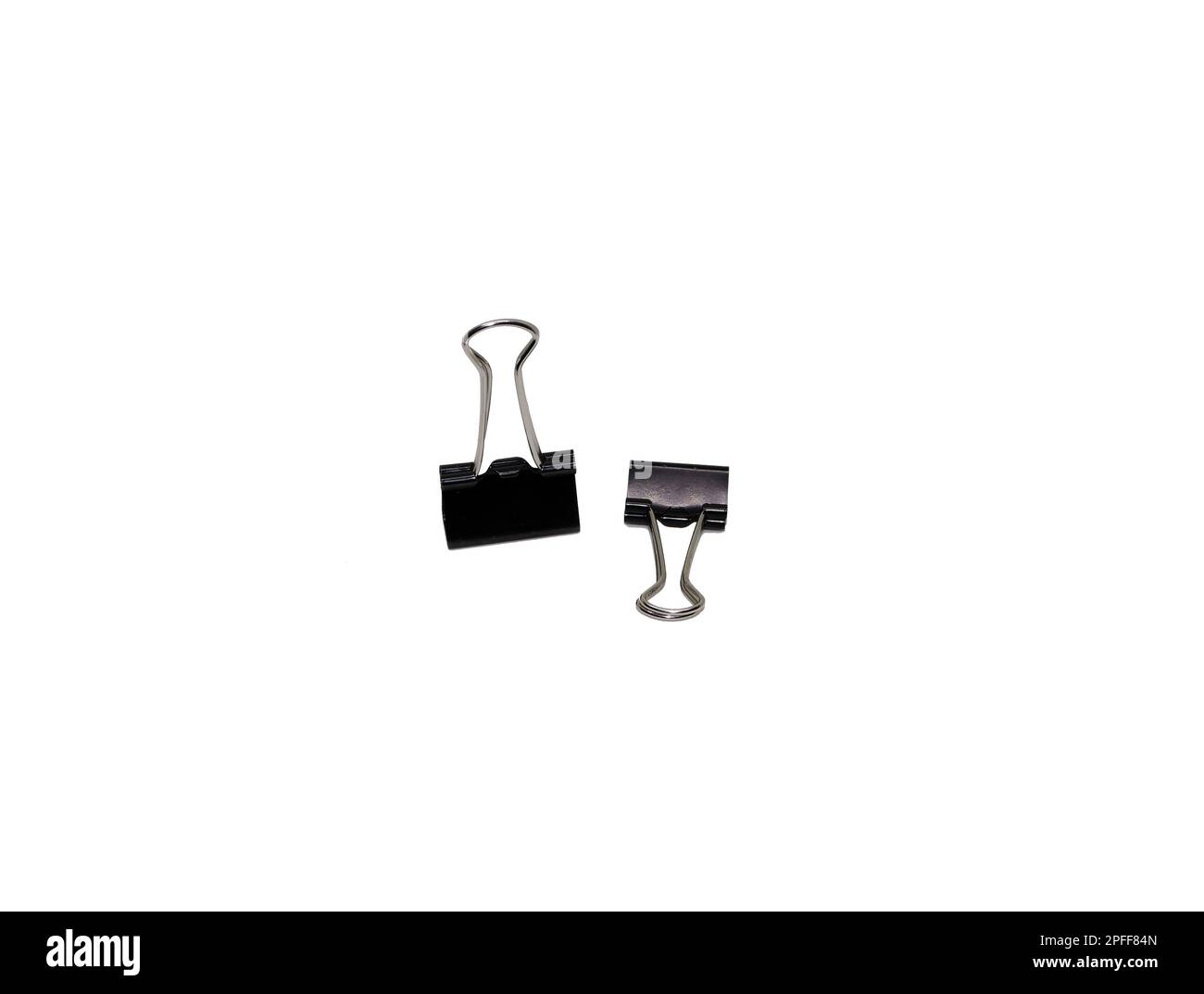 Black binder clip or bobby clip isolated to white background Stock ...