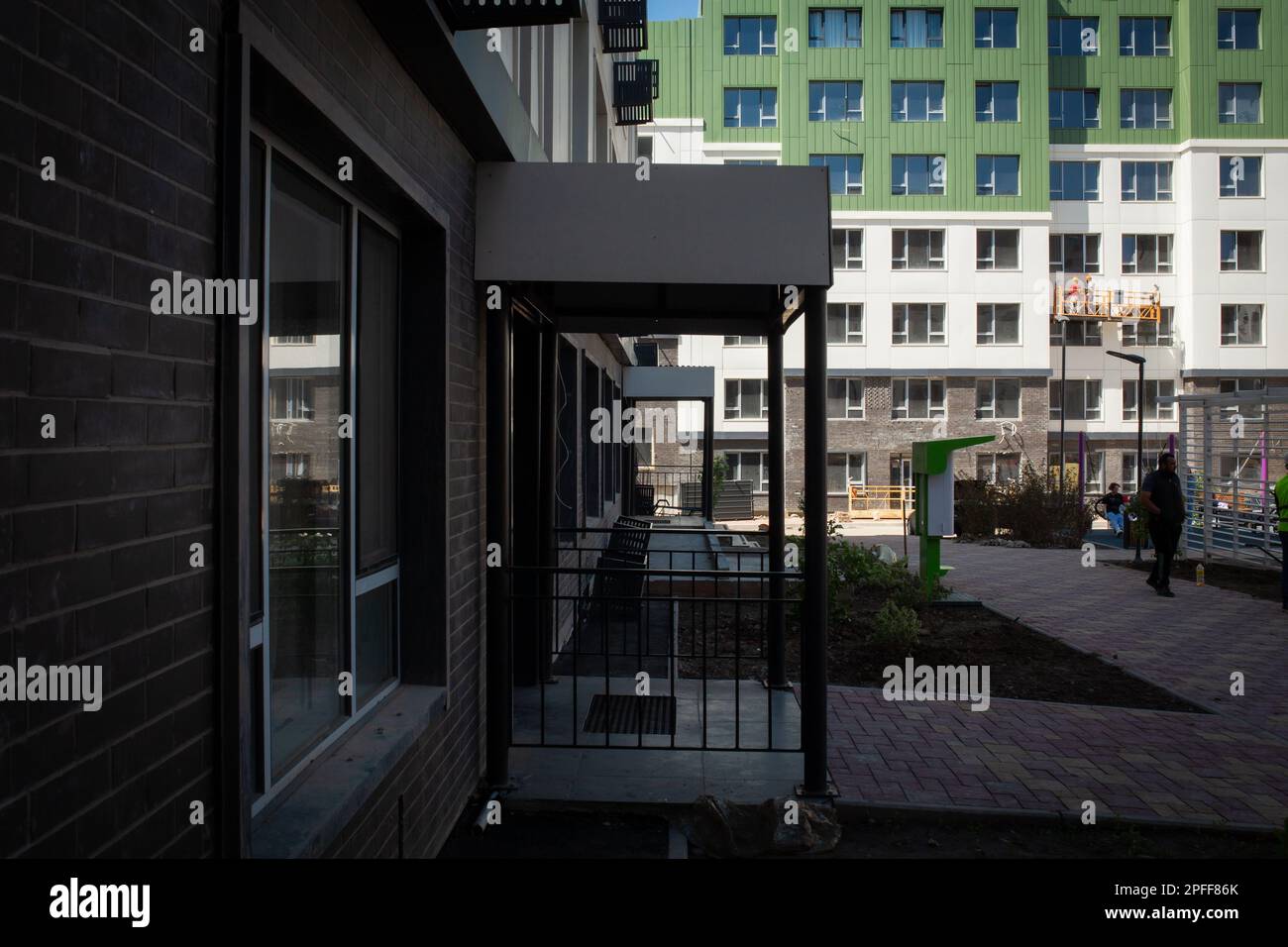 entrance of a multi-storey building. house repair service Stock Photo ...