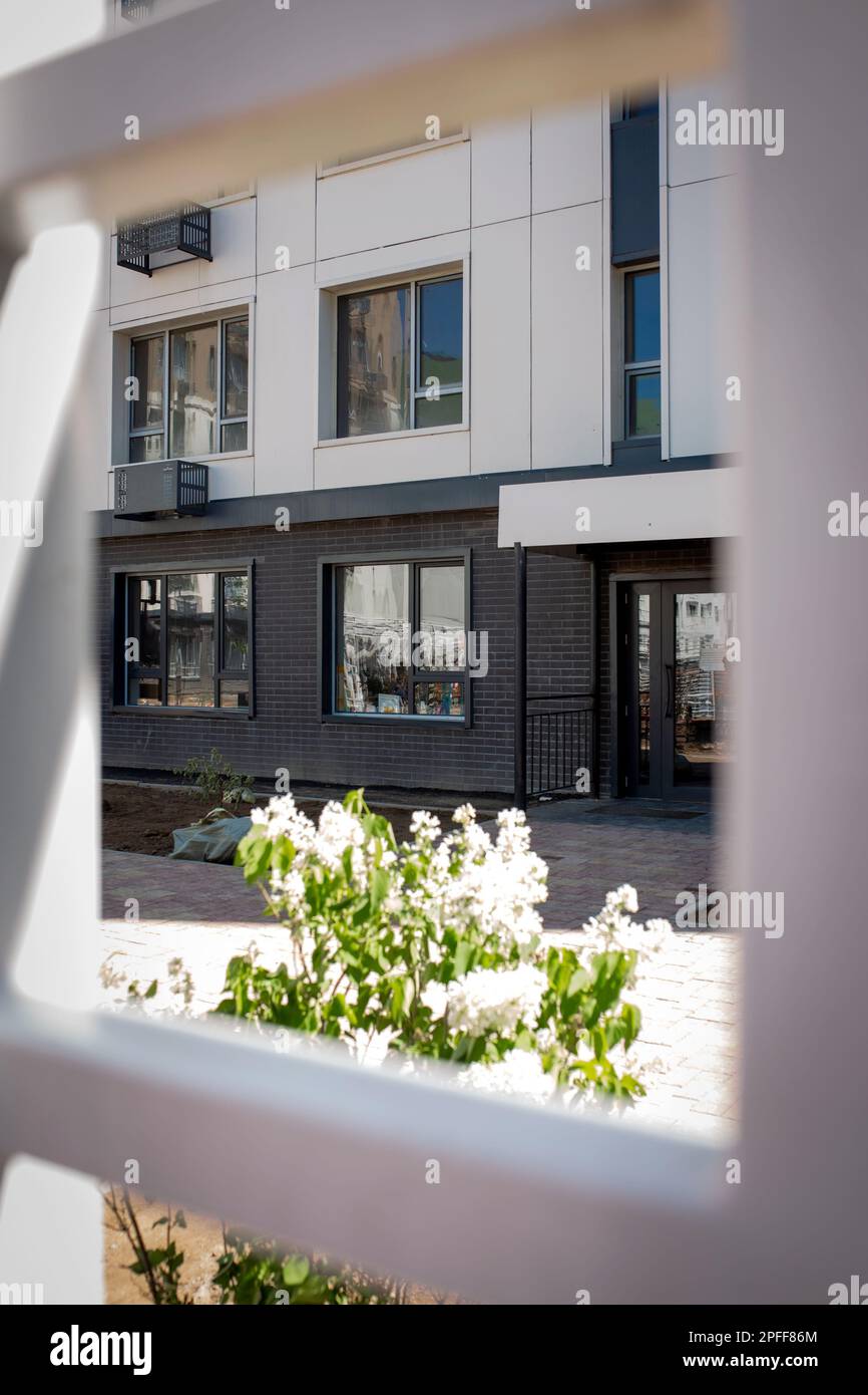 entrance of a multi-storey building. house repair service Stock Photo ...