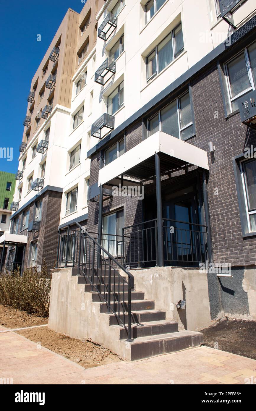 entrance of a multi-storey building. house repair service Stock Photo ...