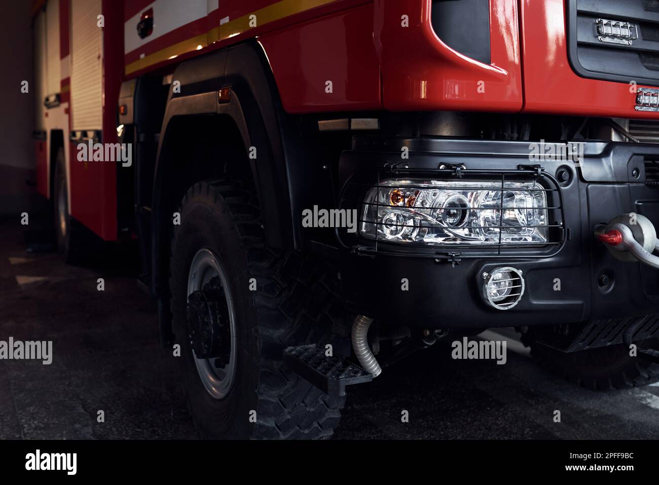 Close up view of red modern fire truck. Front part of vehicle Stock ...