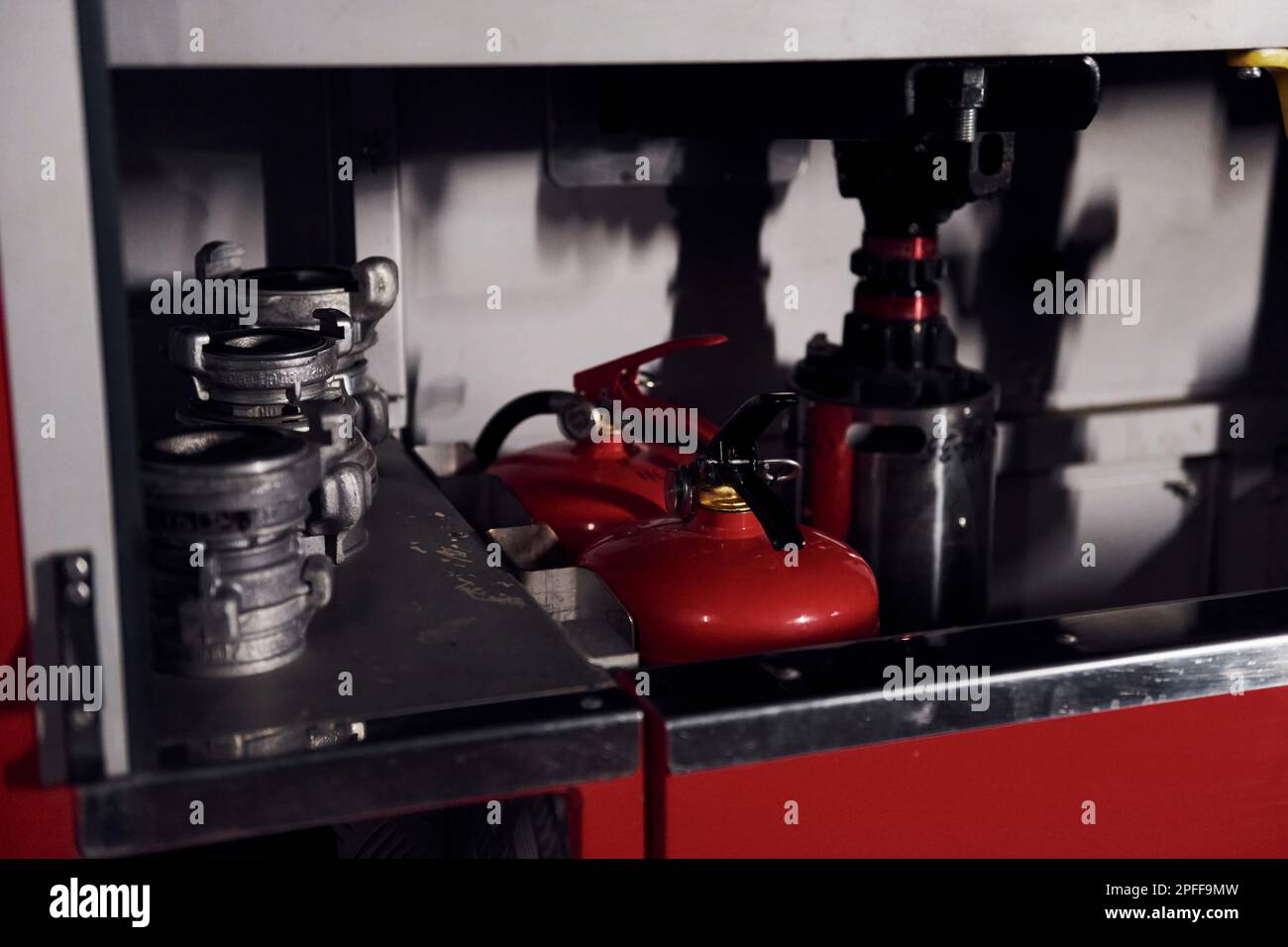 Inside of fire truck. Close up view of equipment and hoses Stock Photo ...