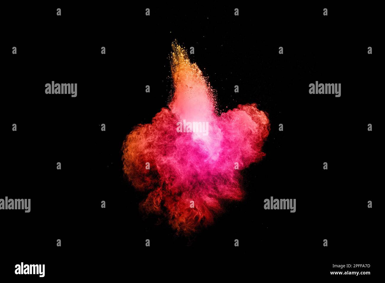 Explosion of pink colored powder isolated on black background.Pink dust ...