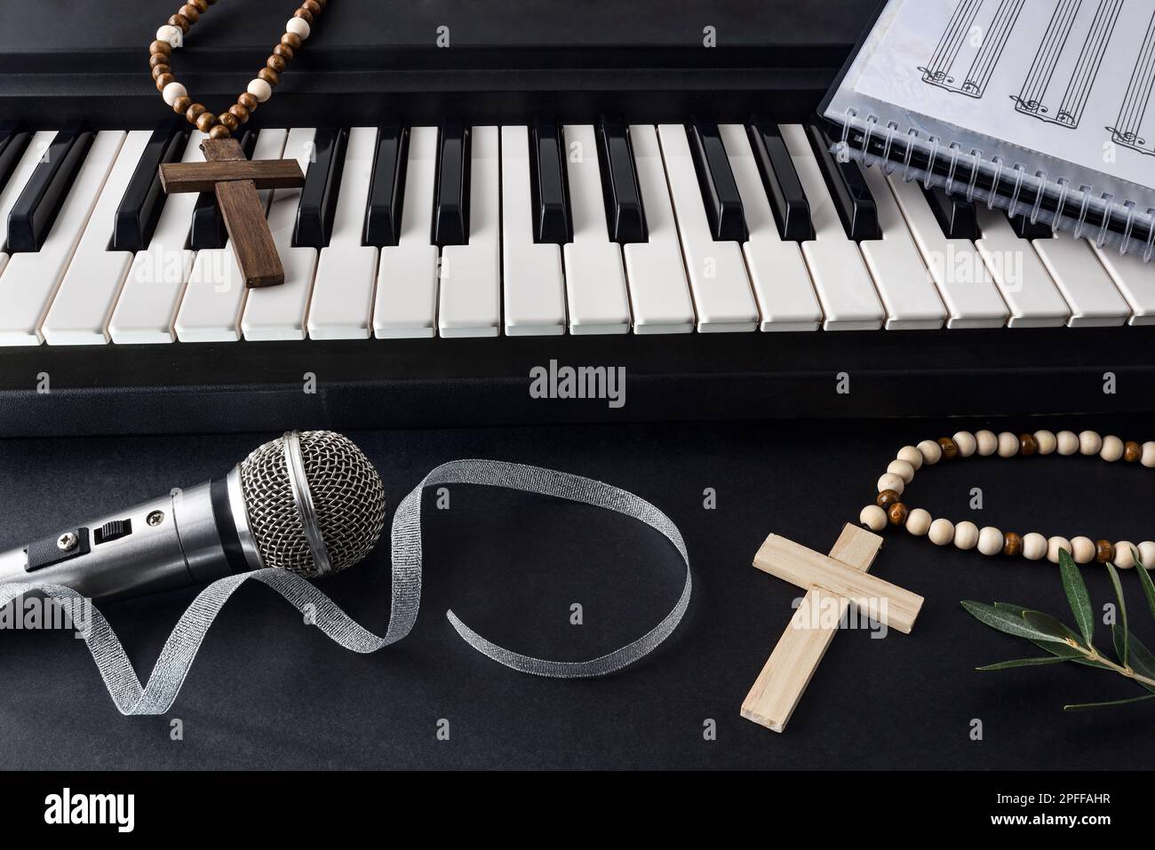 Easter christian religious concert with piano and microphone on black ...
