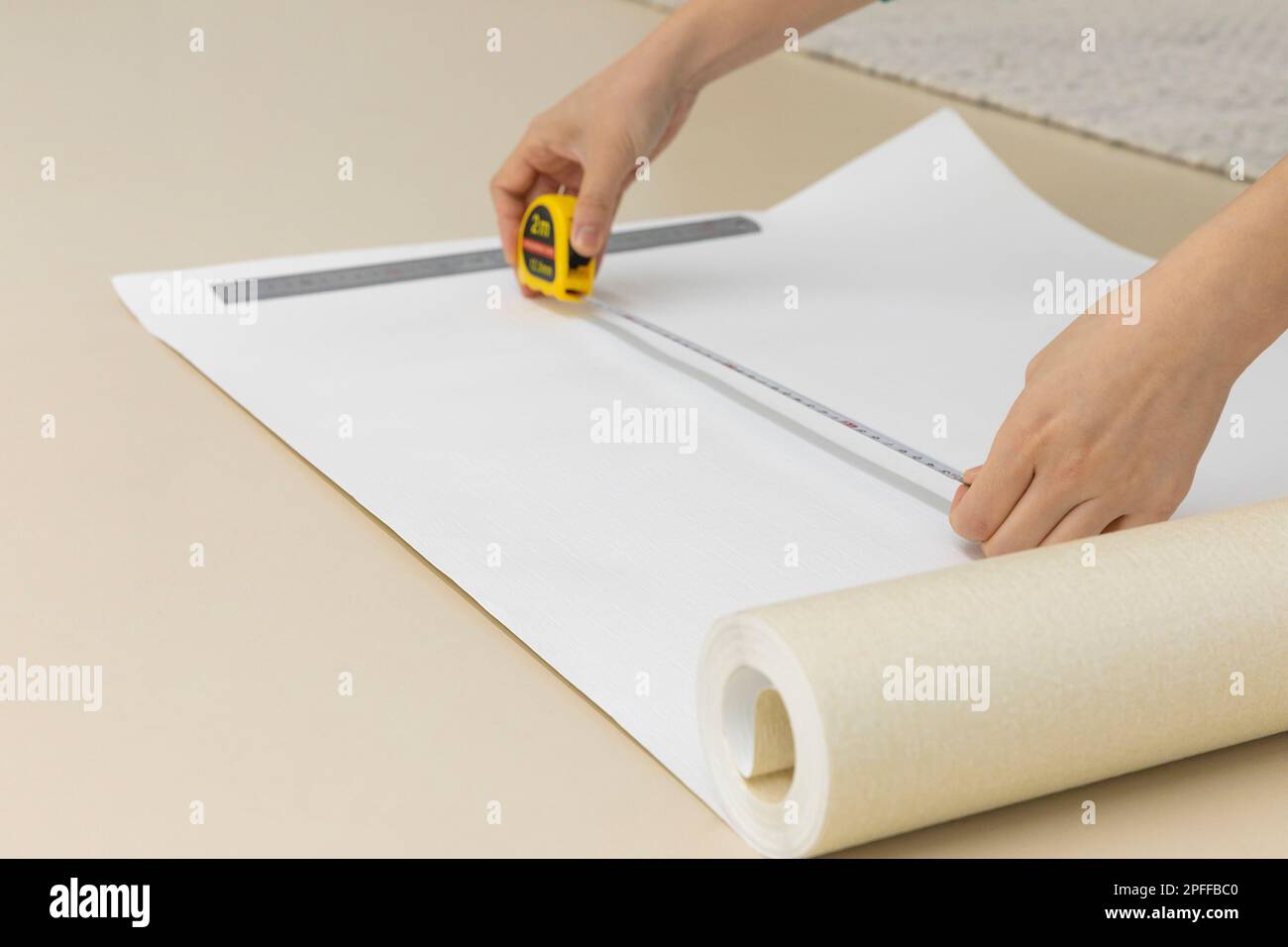 DIY interior hand motion, closeup wallpaper length measurement Stock ...