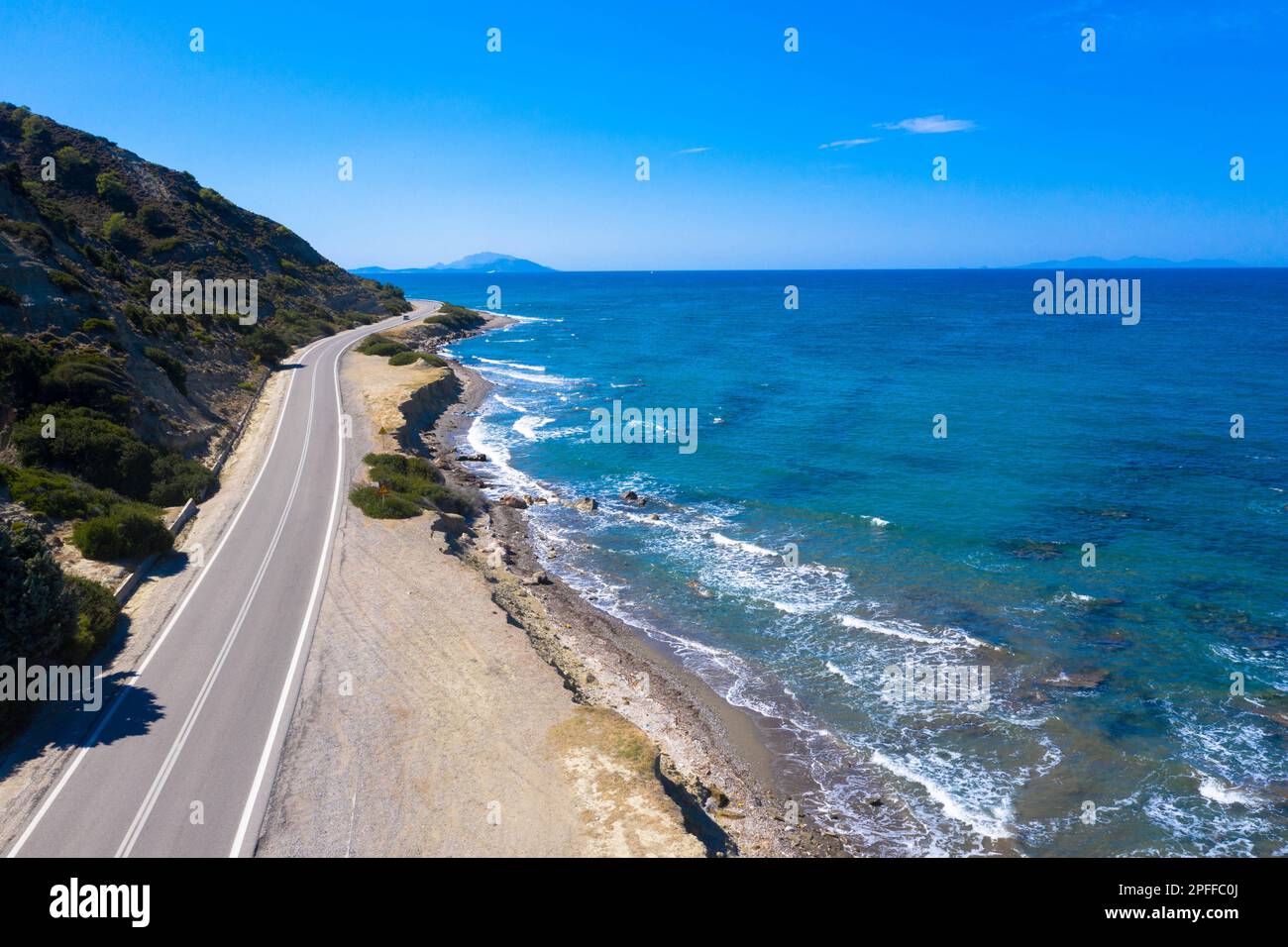 Aerial view of Amiros Beach along the beautiful country road. Located ...