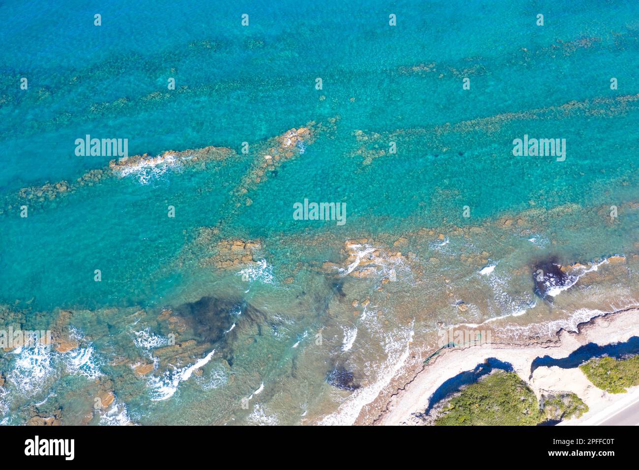 Aerial drone top view of beautiful sea waves and fantastic rocky coast ...
