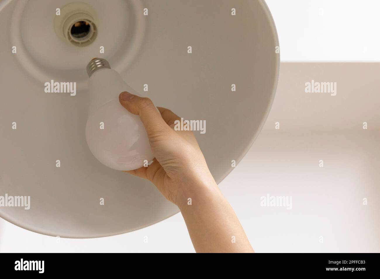 Changing light bulbs hi-res stock photography and images - Alamy