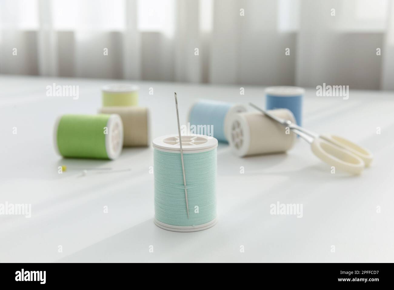 aesthetic photo of handmade, crafting hobbies, thread and a needle ...