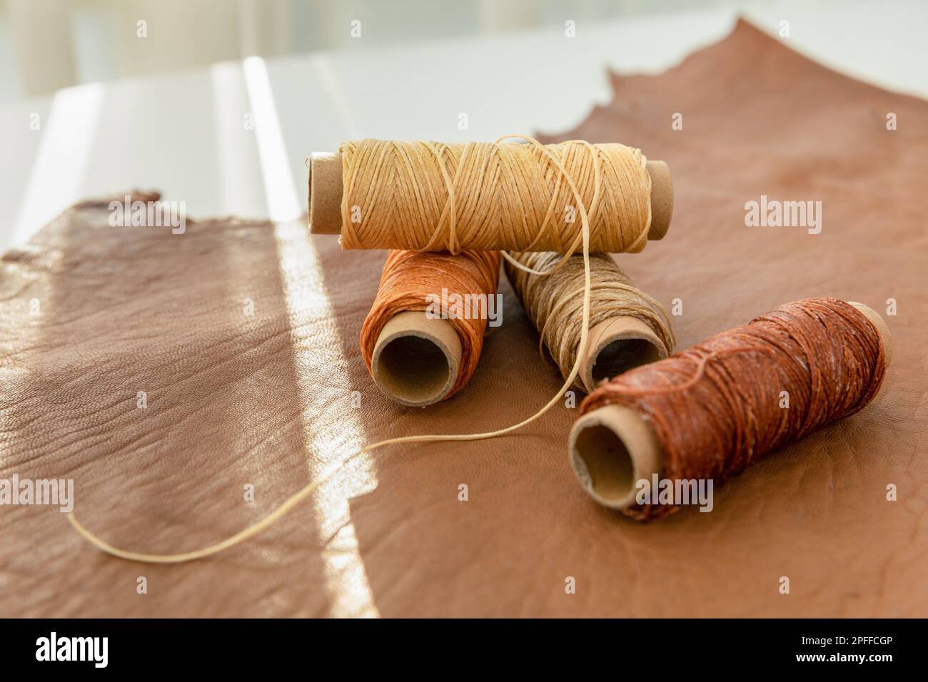 aesthetic photo of handmade, crafting hobbies, leather and wax thread ...