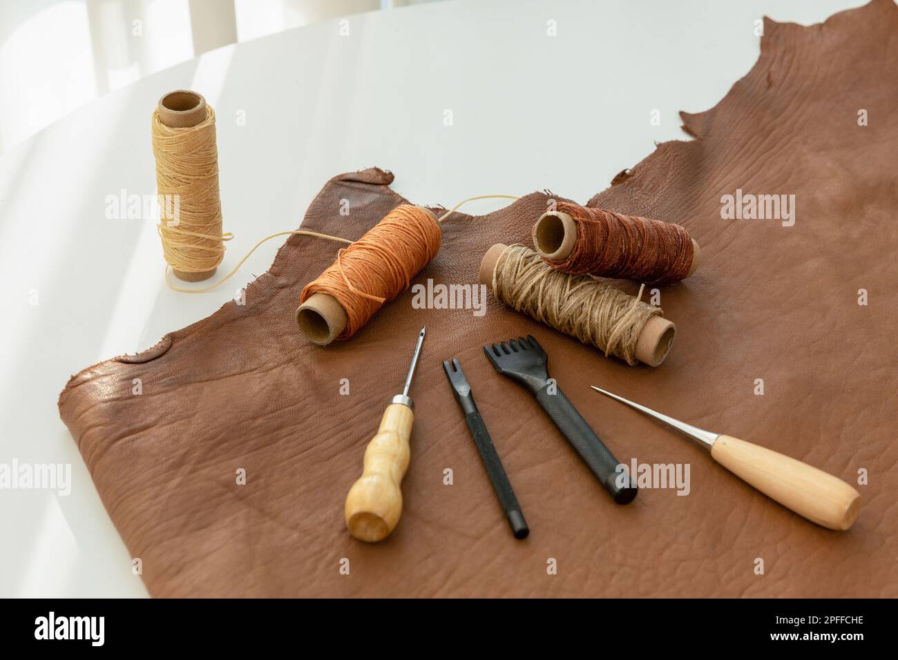 aesthetic photo of handmade, crafting hobbies, leather and wax thread ...