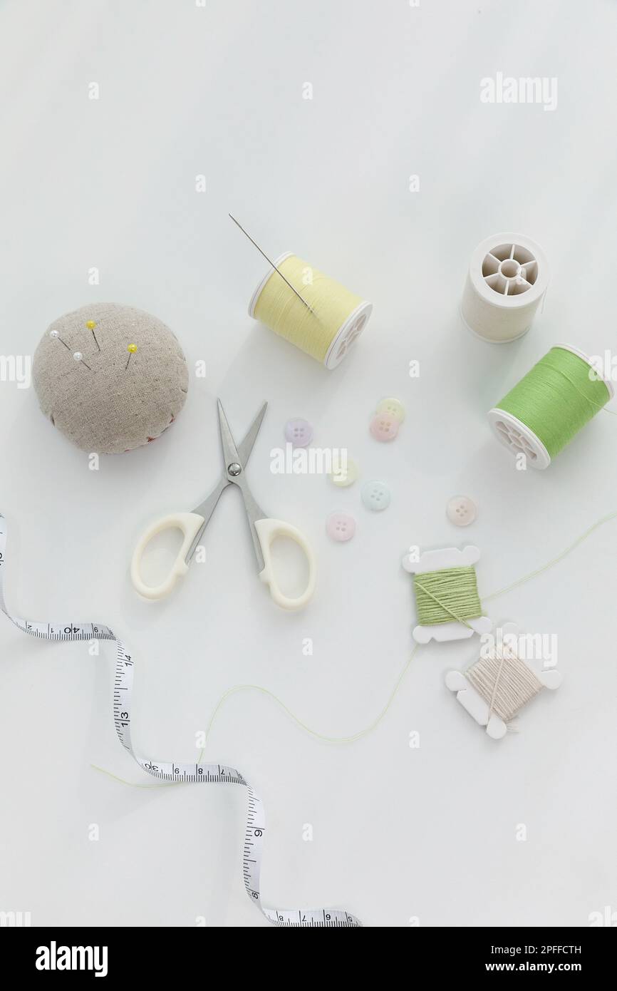 aesthetic photo of handmade, crafting hobbies, thread, button, needle ...