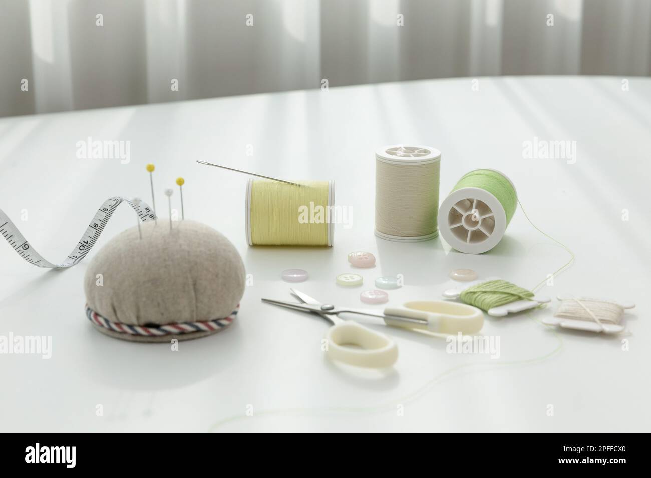 aesthetic photo of handmade, crafting hobbies, thread, button, needle ...