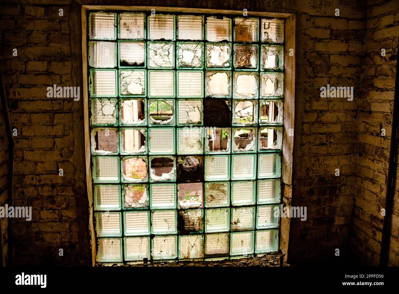 The window of an abandoned industrial factory Stock Photo - Alamy