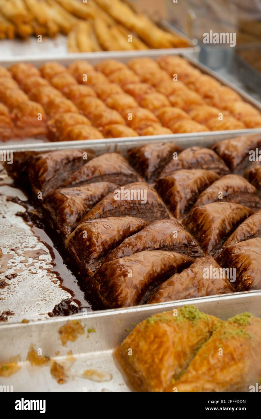 Various types or many colorful assortment of Turkish sweets for sale in ...