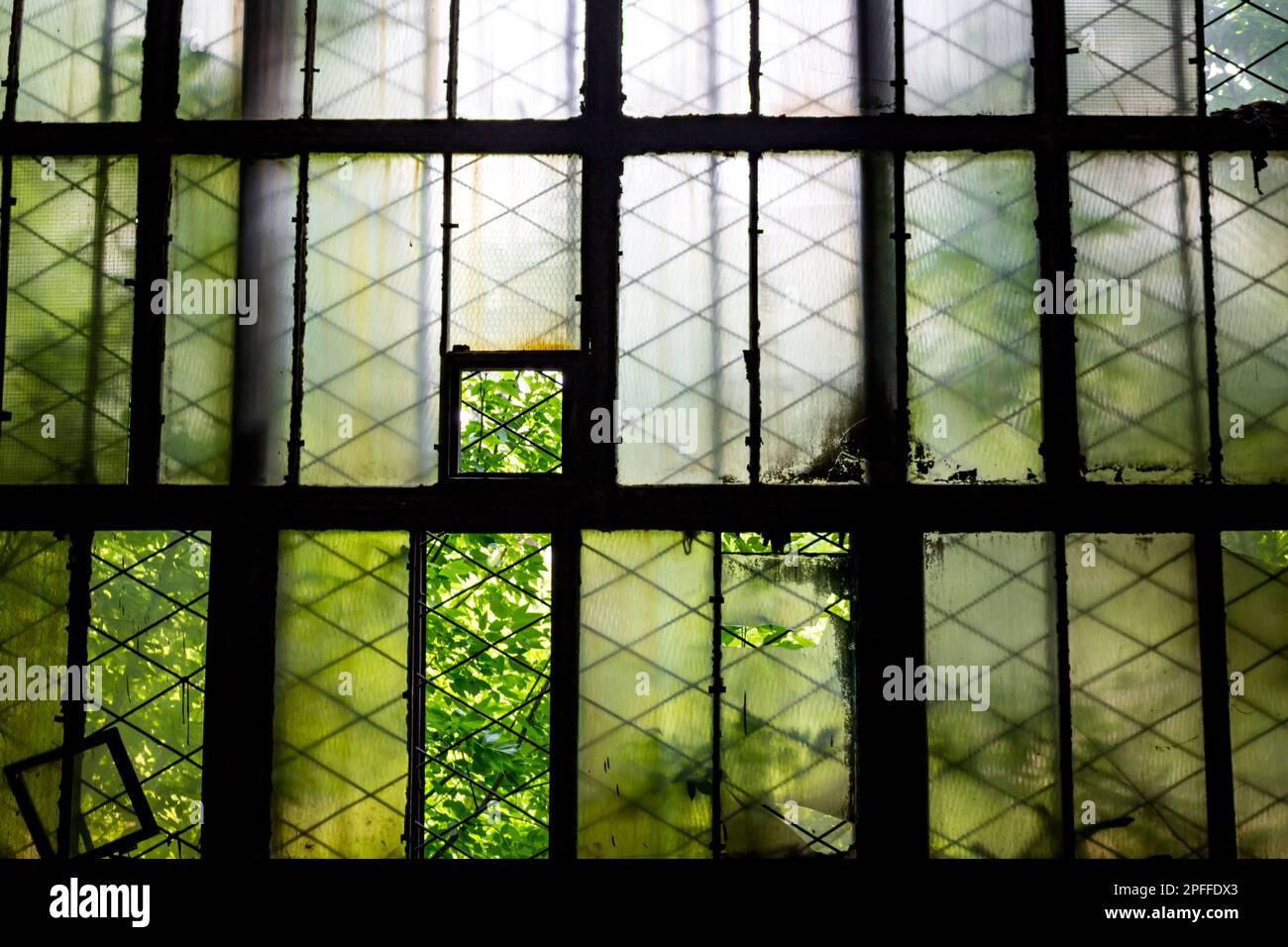 Broken windows in the old Industrial factory Stock Photo - Alamy
