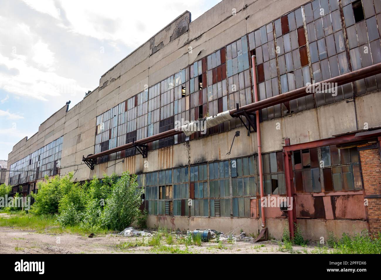 The abandoned old factory building outside Stock Photo - Alamy