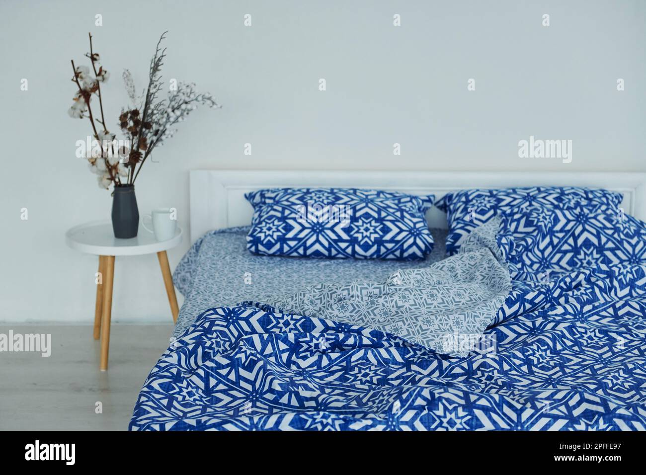Blue colored bed. Interior and design of beautiful modern bedroom at ...