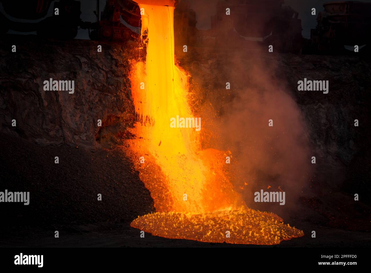 Discharge of metallurgical slag from blast furnaces. Beautiful stream ...