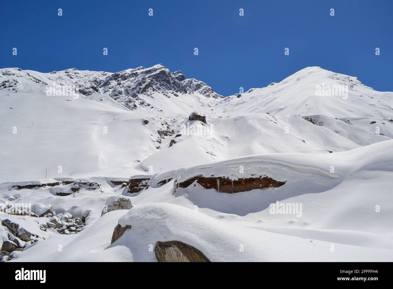 Snow-covered mountain peaks in Himalaya India. The Great Himalayas or ...