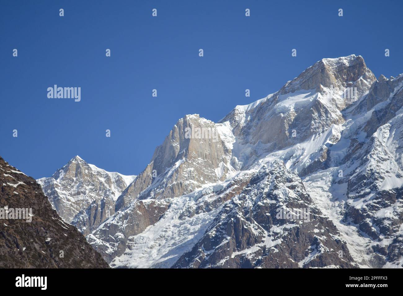 Snow-covered mountain peaks in Himalaya India. The Great Himalayas or ...
