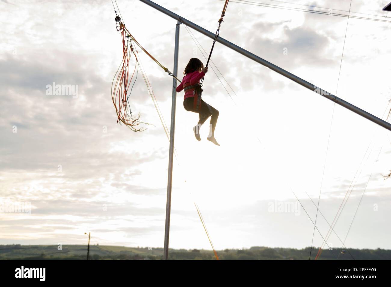 Children bungee jumping hi-res stock photography and images - Alamy