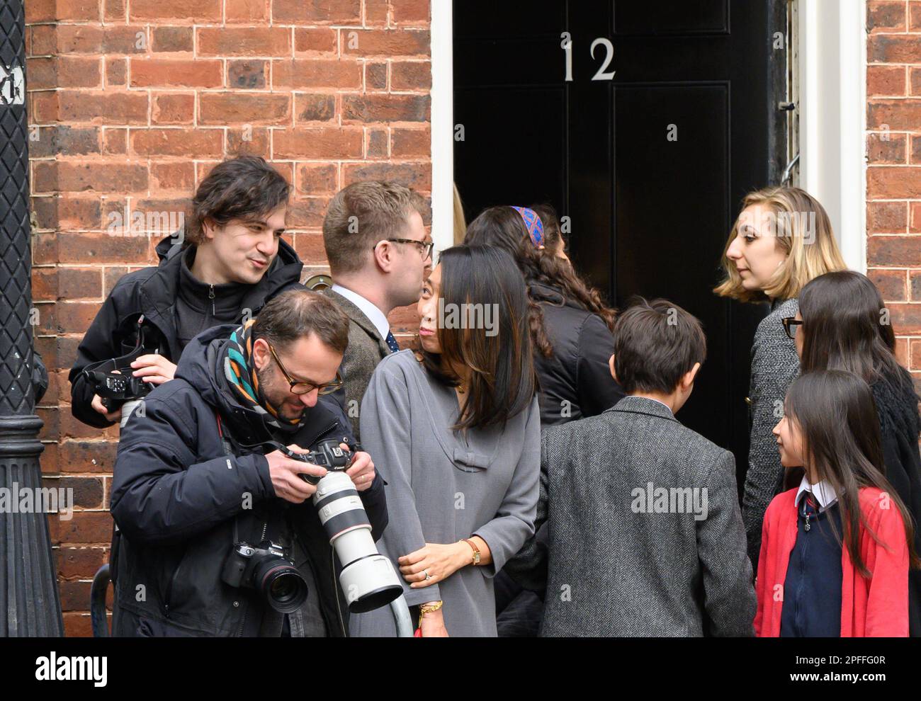 Jeremy Hunt's family look on as he and the treasury team pose for ...