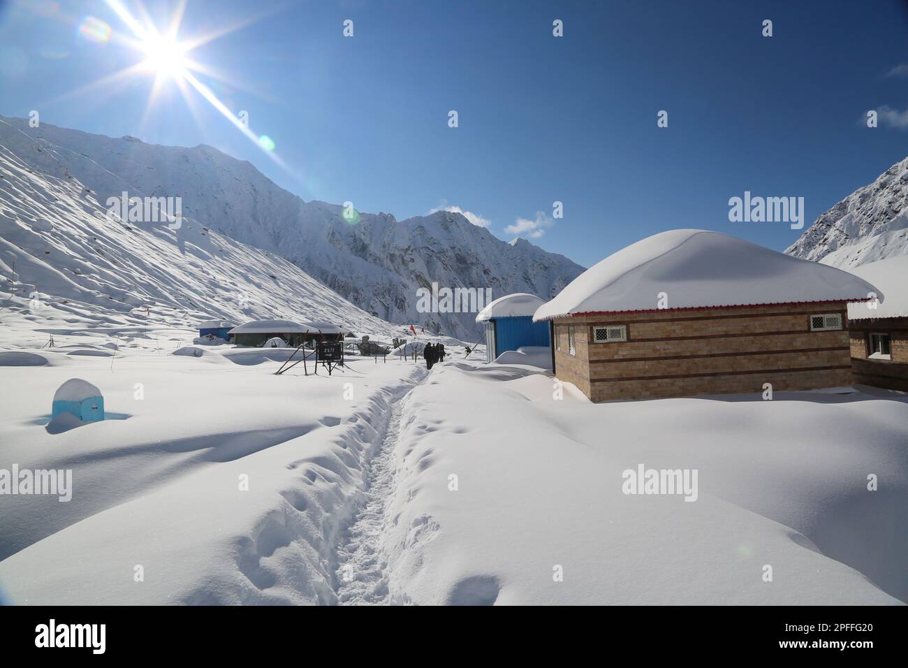 Snow covered peaks and mountain in Himalaya India. The Himalayas is a ...