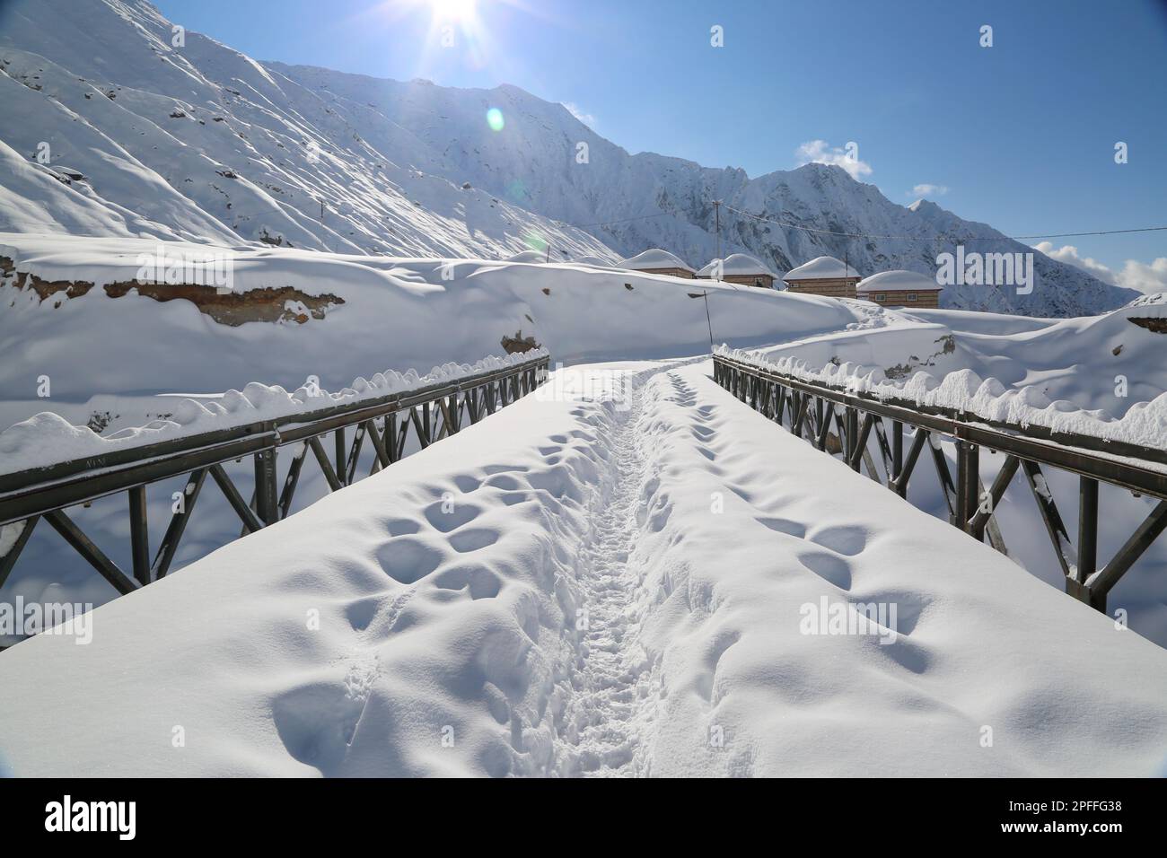 Snow covered mountain peaks and sunrise in Himalaya. Dotted with long ...