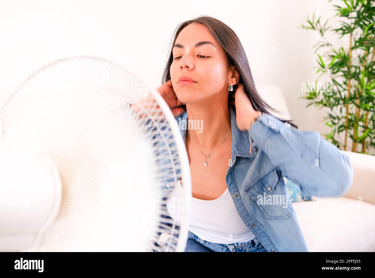 Woman suffering heat exhaustion hi-res stock photography and images - Alamy