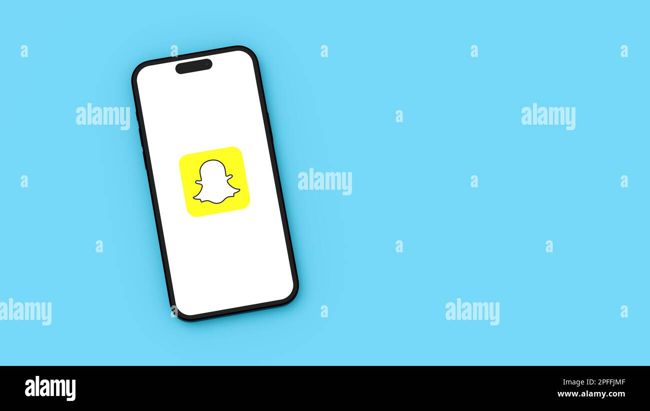 Snapchat Logo on Mobile Phone Screen on Blue Background with Copy Space ...
