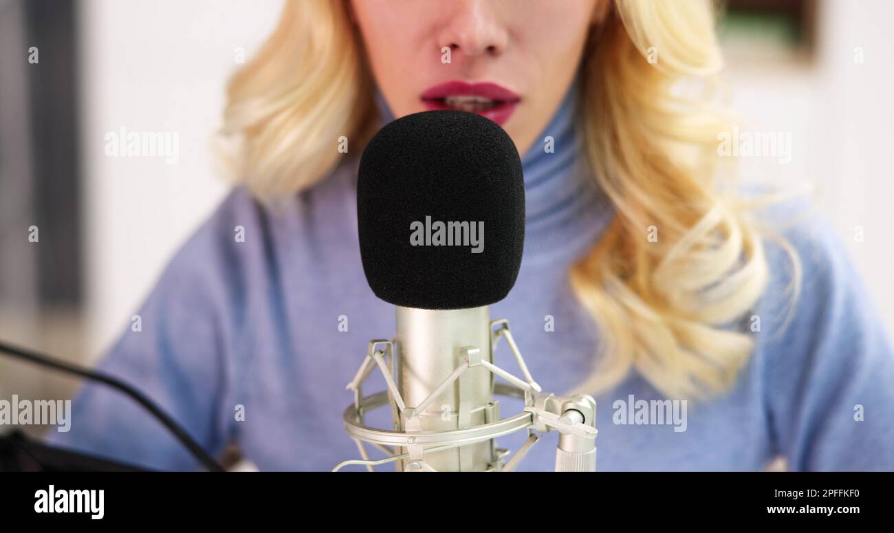 Young Woman Recording ASMR Sounds On Microphone Stock Photo - Alamy
