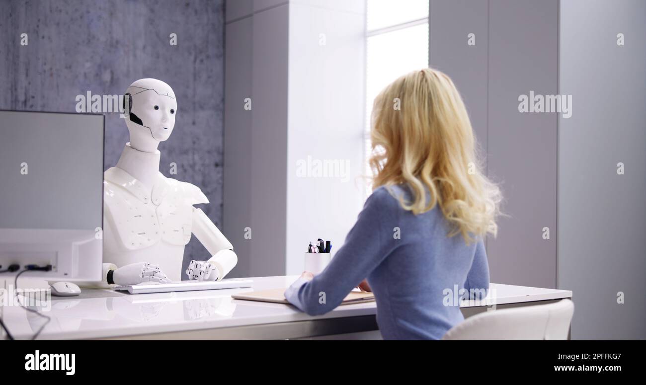 Men At Interview With AI Robot Machine Stock Photo - Alamy
