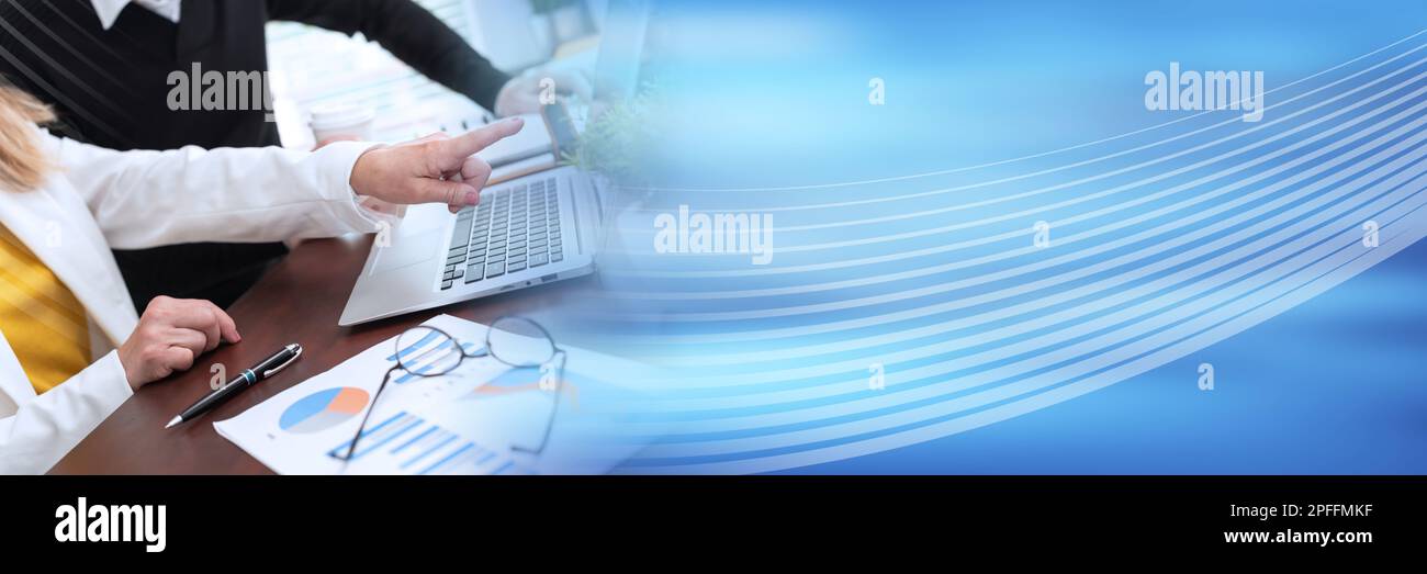 Two business people working together in office; panoramic banner Stock ...