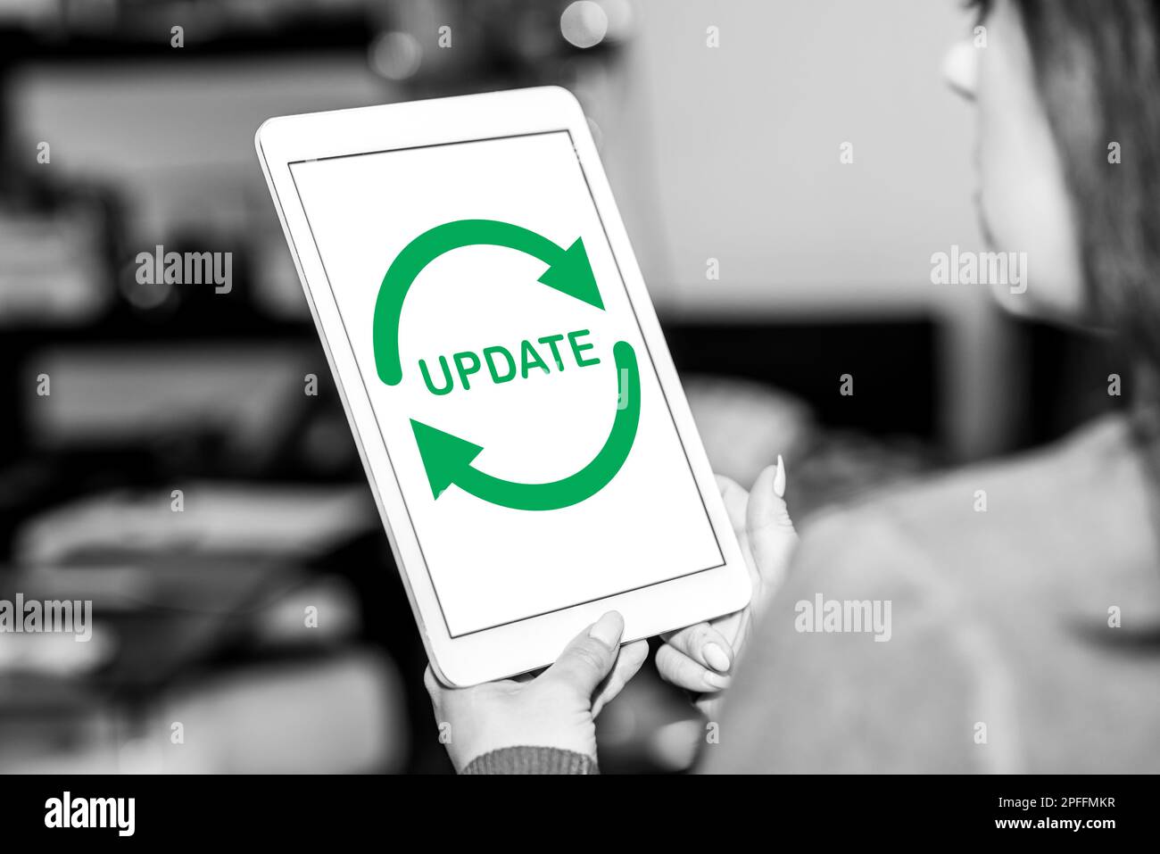 Tablet screen displaying an update concept Stock Photo - Alamy