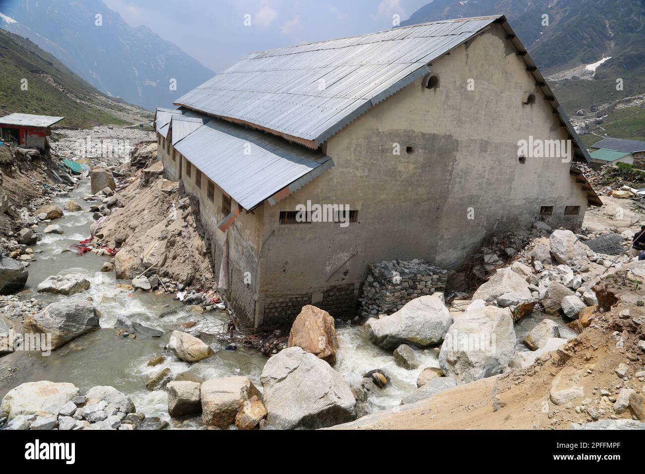 Damaged building, pathway, sheds in Kedarnath disaster India. Kedarnath ...